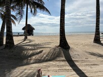 Barely anyone was on the sand ocean view area.