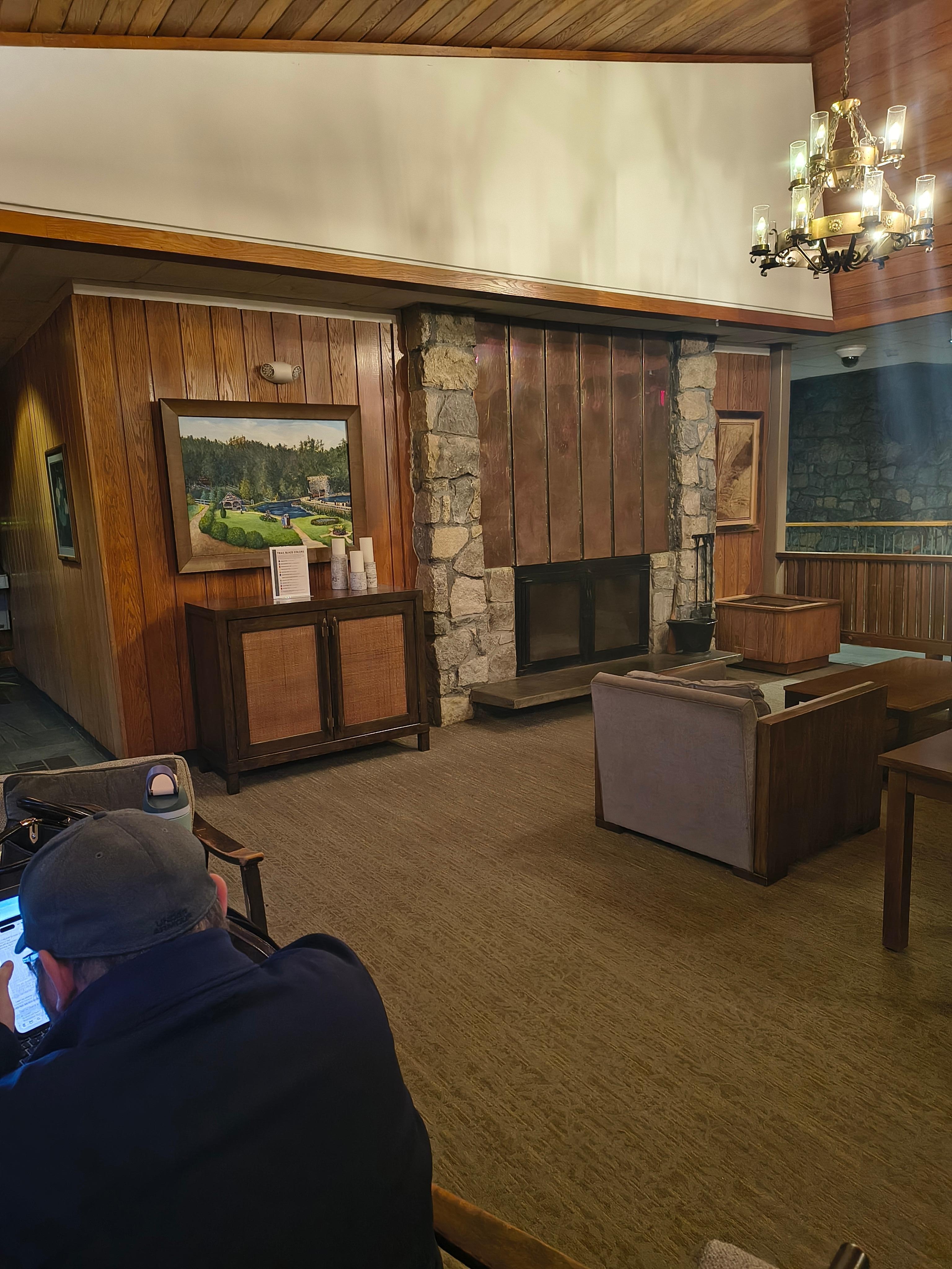 The wood paneling lounge area reminds me of old country aesthetic of my grandparents