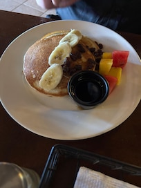 Pancakes— we added mango and pineapple (provided as a side).