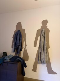 Seriously, who thought shadow figures painted on the wall in the rooms was a good idea? They have clothes hooks on them too so it looks even more like a person is in your room in the middle of the night.