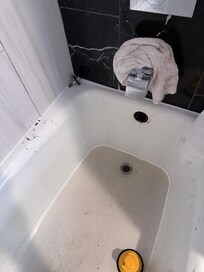 Shower was clogged made mess all over bathroom