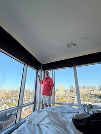 This is how to manually hold the window shade open, with the cord.