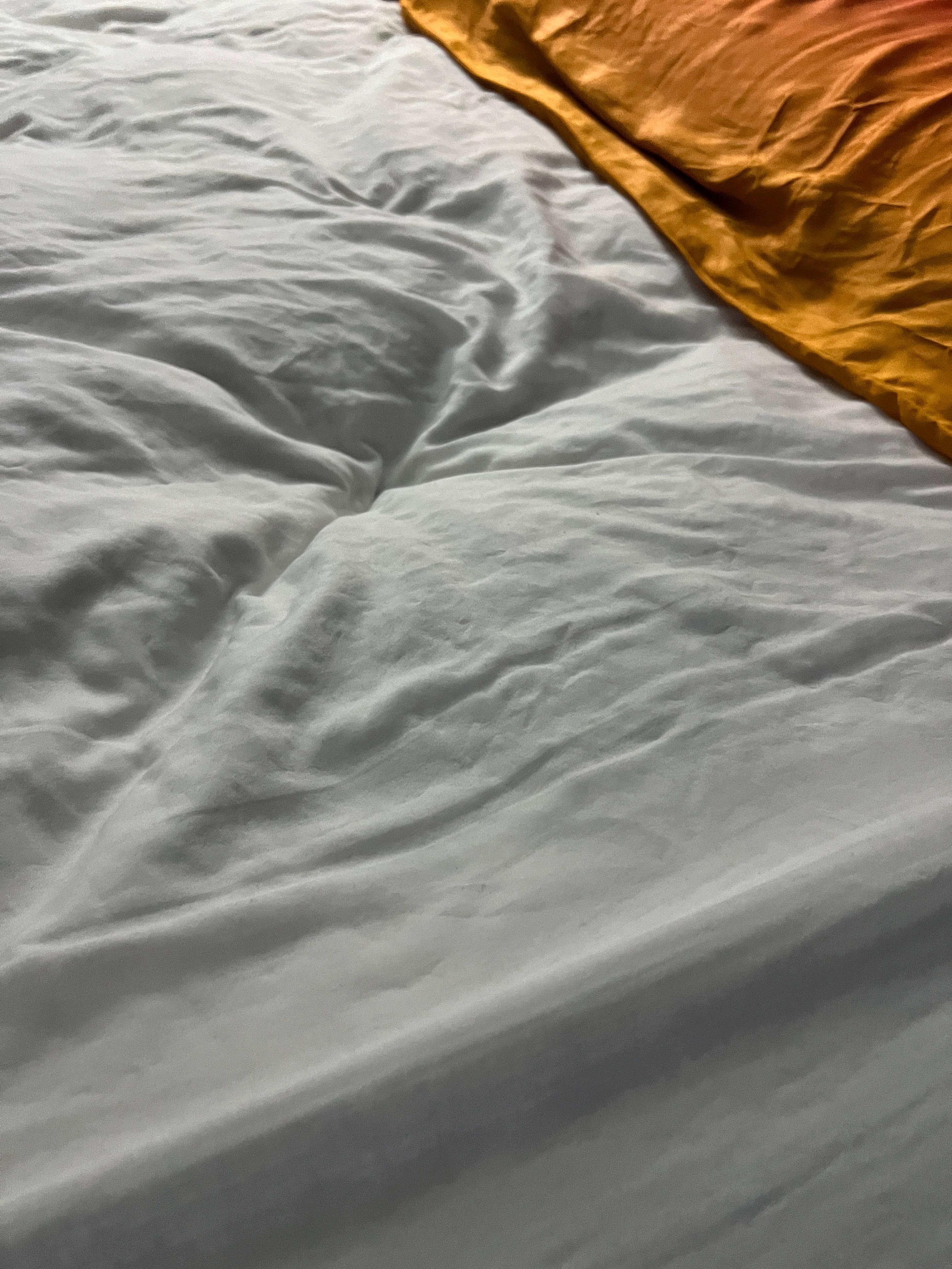 Kingsize bed deep, and long “trough like” hole on right side of bed (Room #207).