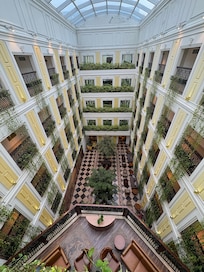 Looking down over library balcony from upper floor common area.