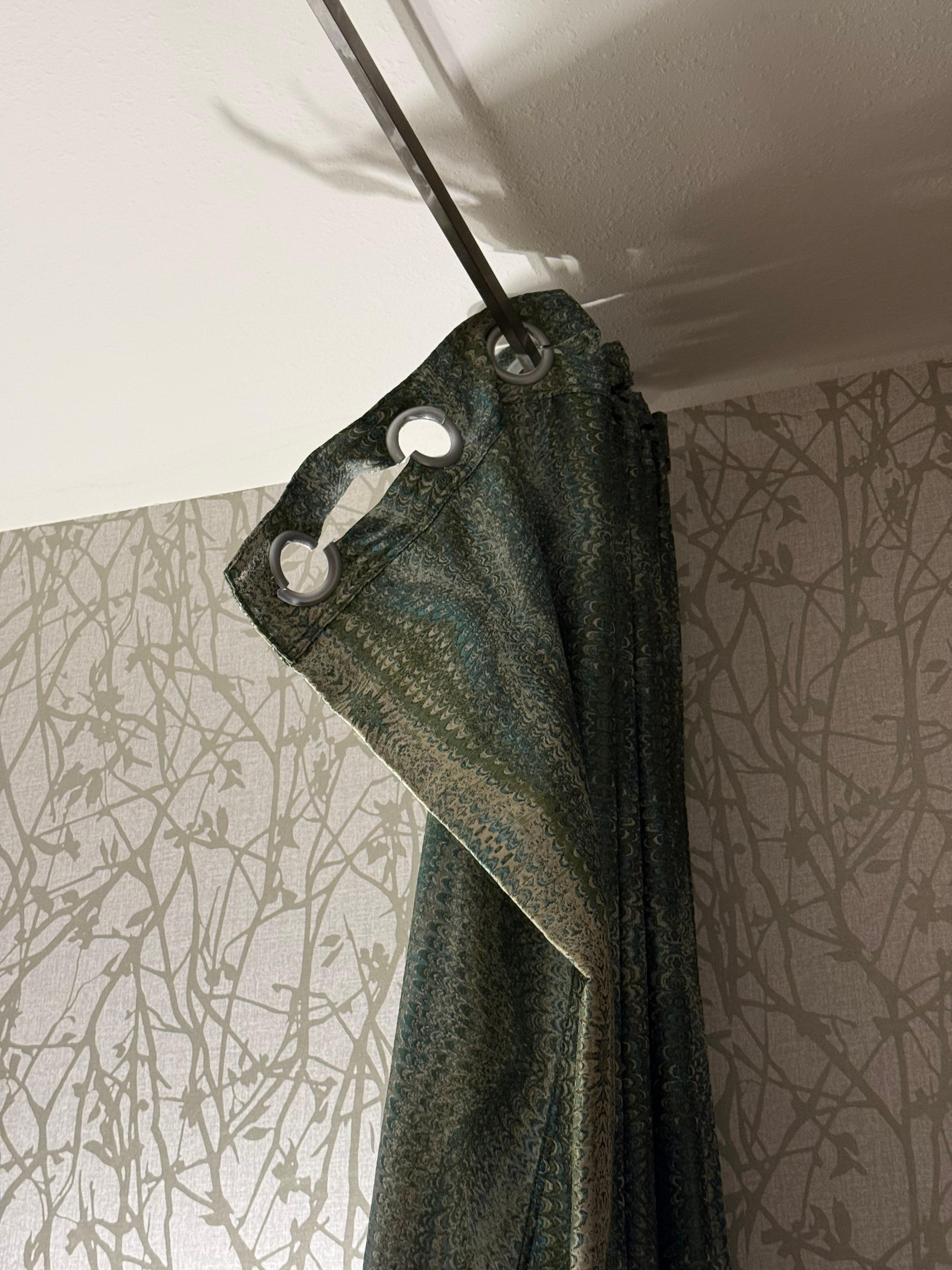 This is the condition of the curtain that separated the sitting area from the beds.