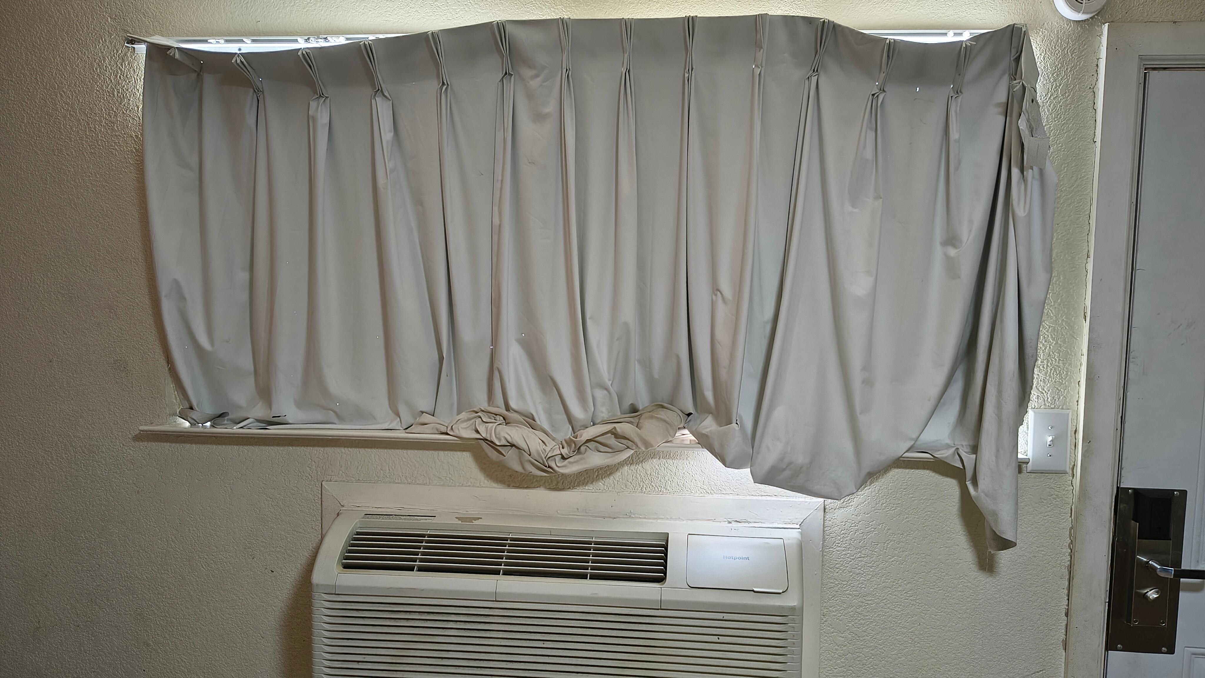 "Curtain" which barely functional AC