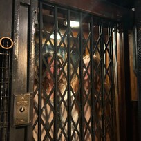 Very “European” lift just big enough for two standing side by side.