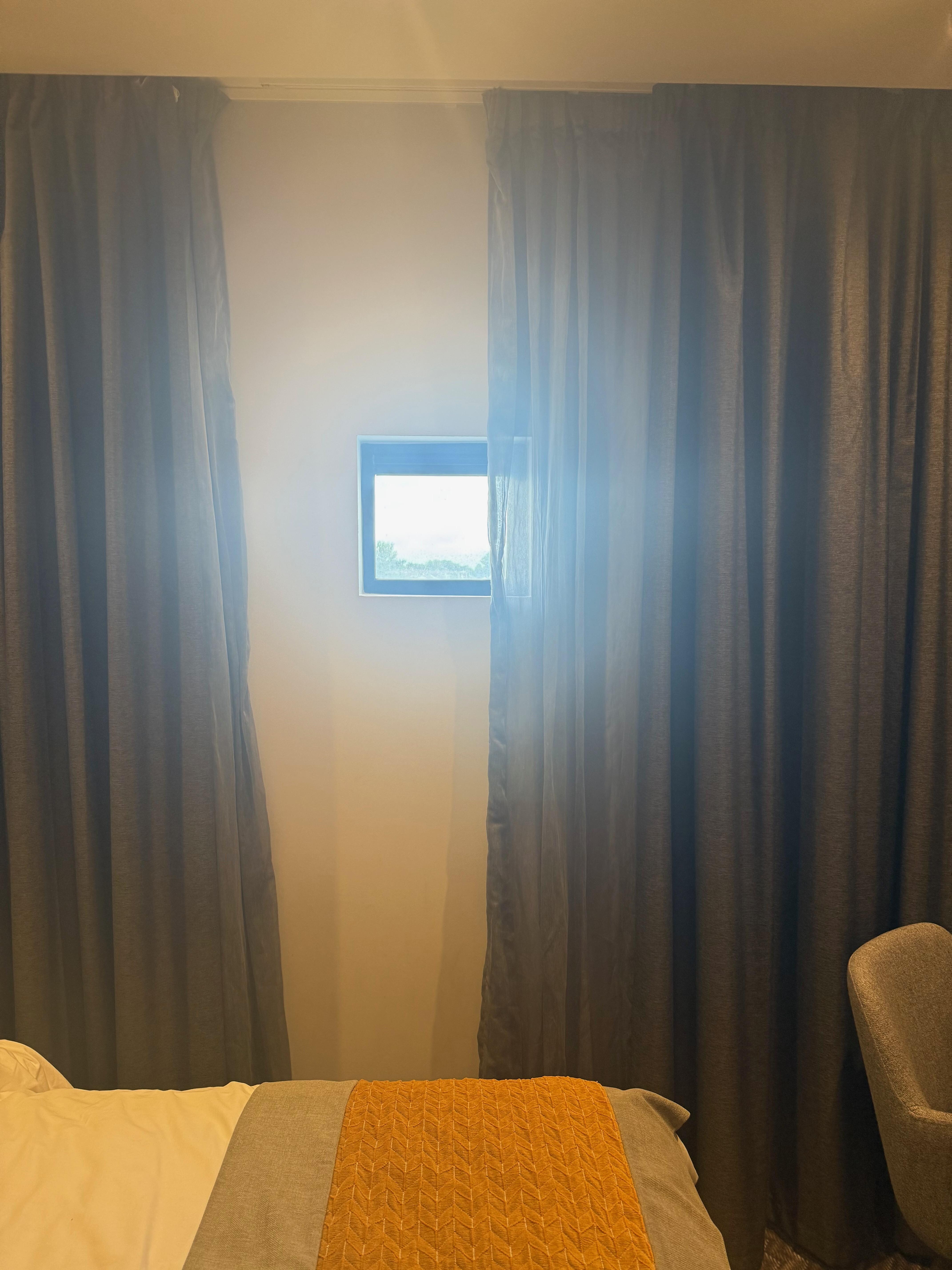 Tiny windows, perfect if you want to keep the room cool, or keep the sun out so you can sleep in! 