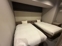 Bedroom with 2 clean, comfortable beds