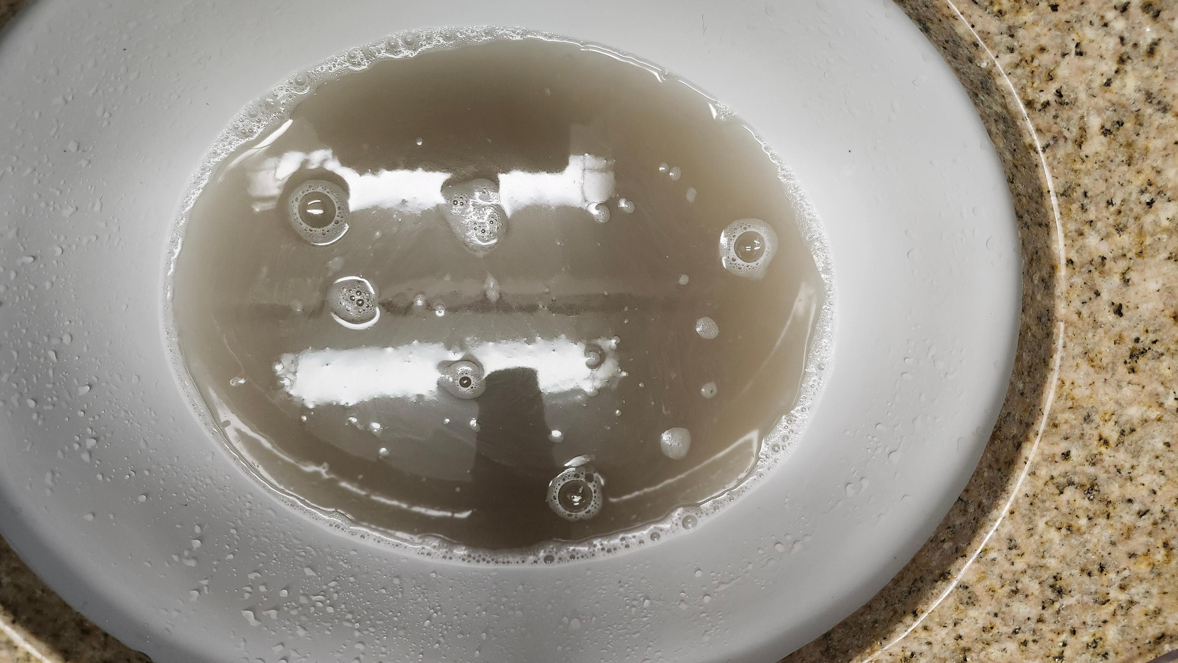 2nd sink of water after 2 floor wipings.