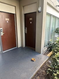 Bowl of cig butts right outside the smoker room, next to the room I rented
