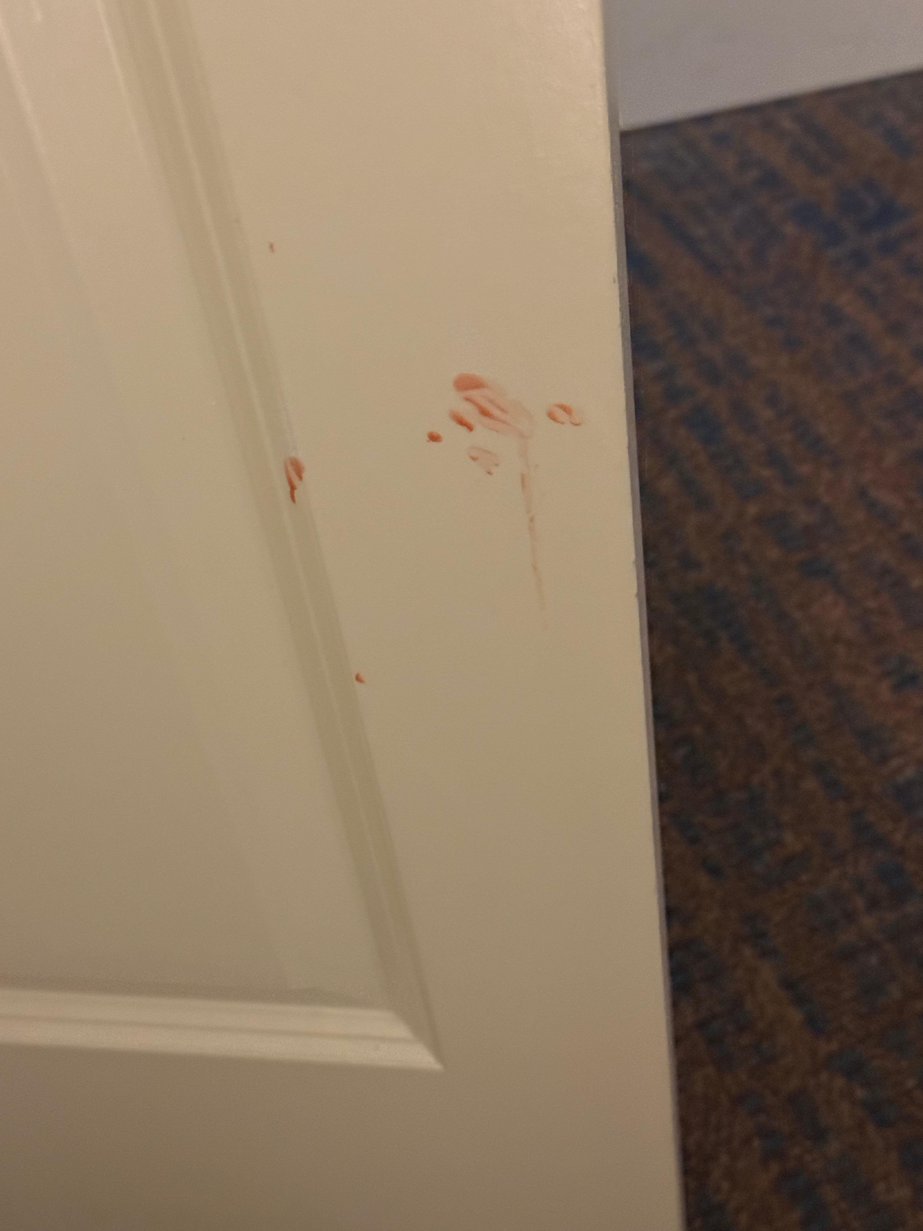 Blood on the back of bedroom door 