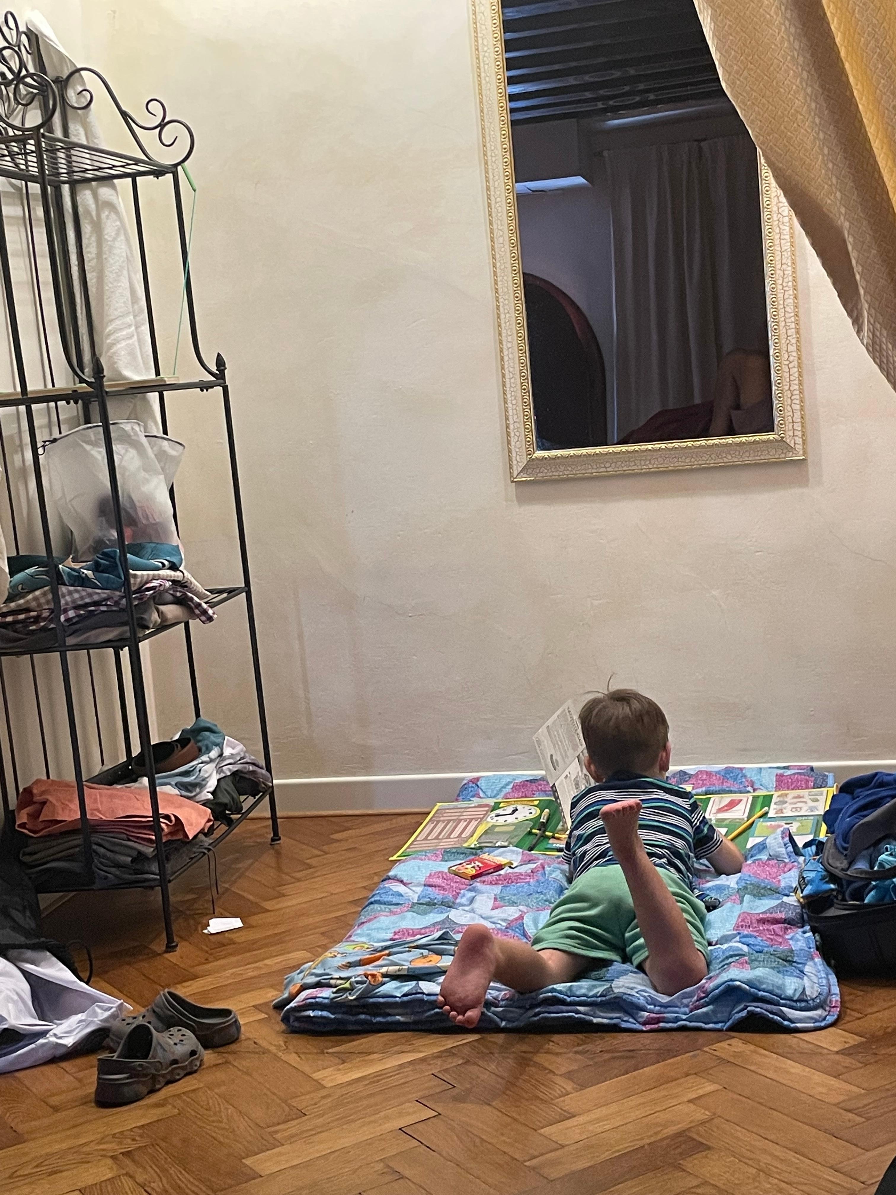 Master Walk-closet with storage and curtains, so our toddler slept and played there.