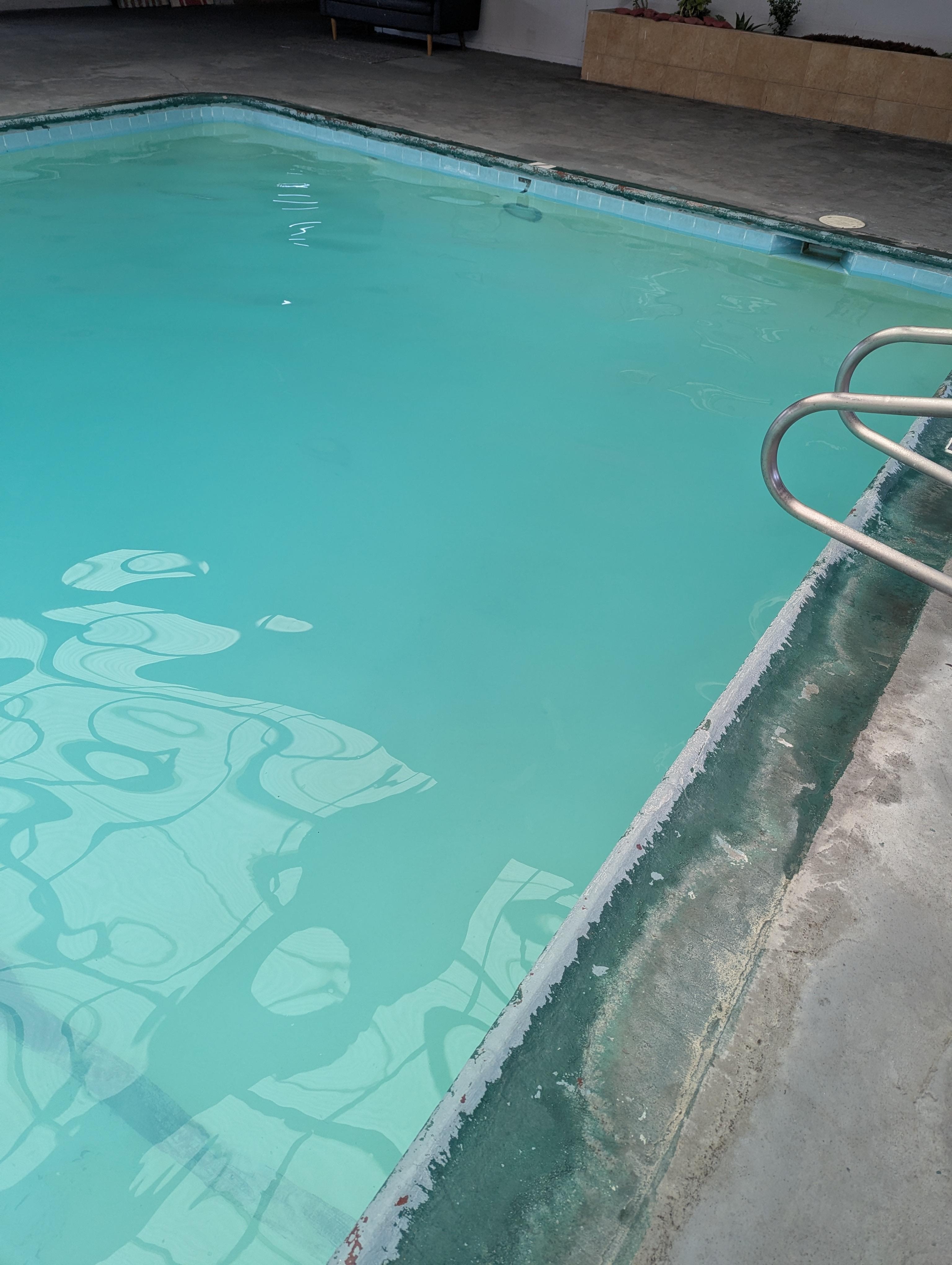 Cloudy water in pool.