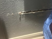 In between the bed and wall