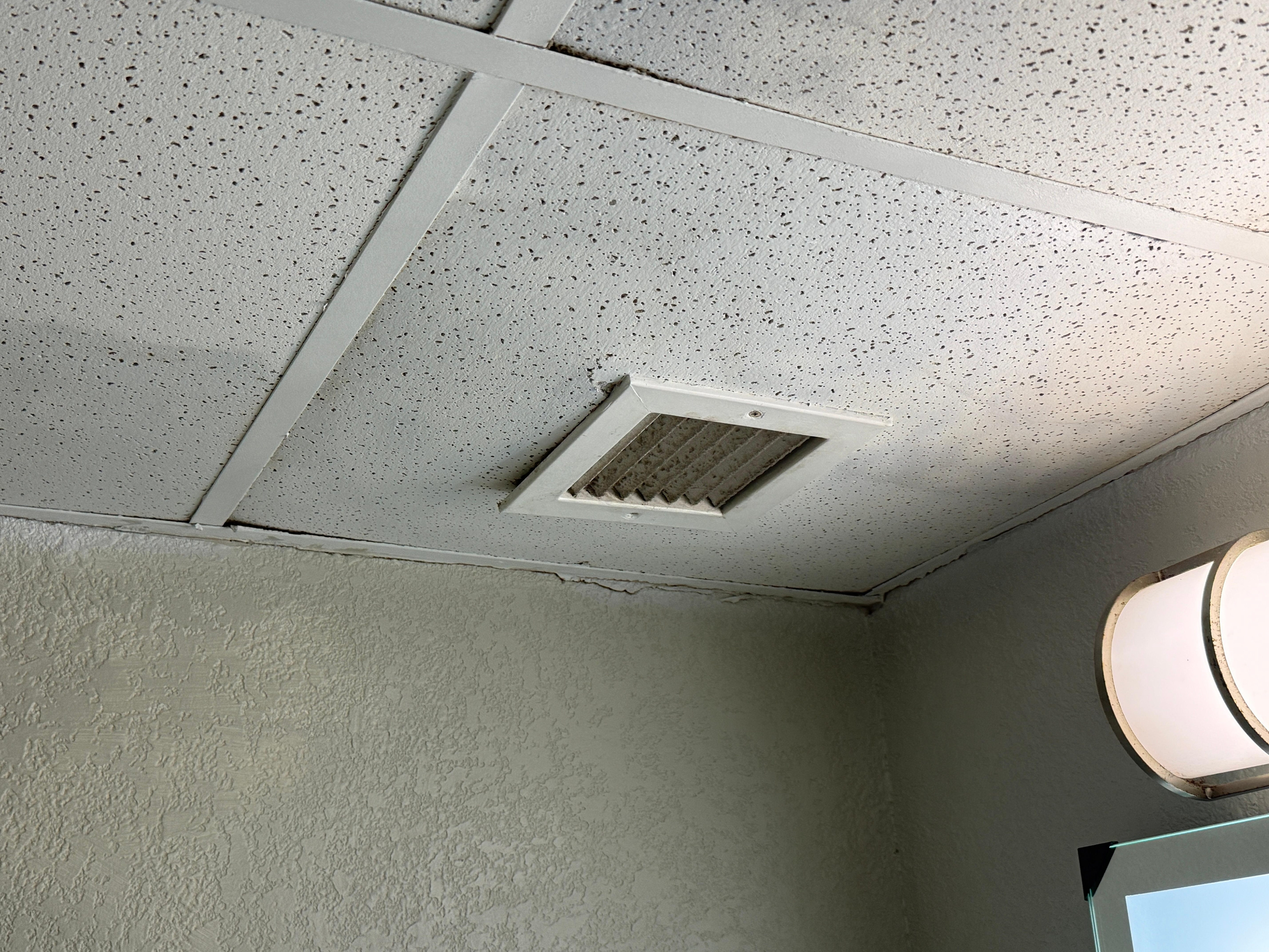 Ceiling tiles about to fall in. 