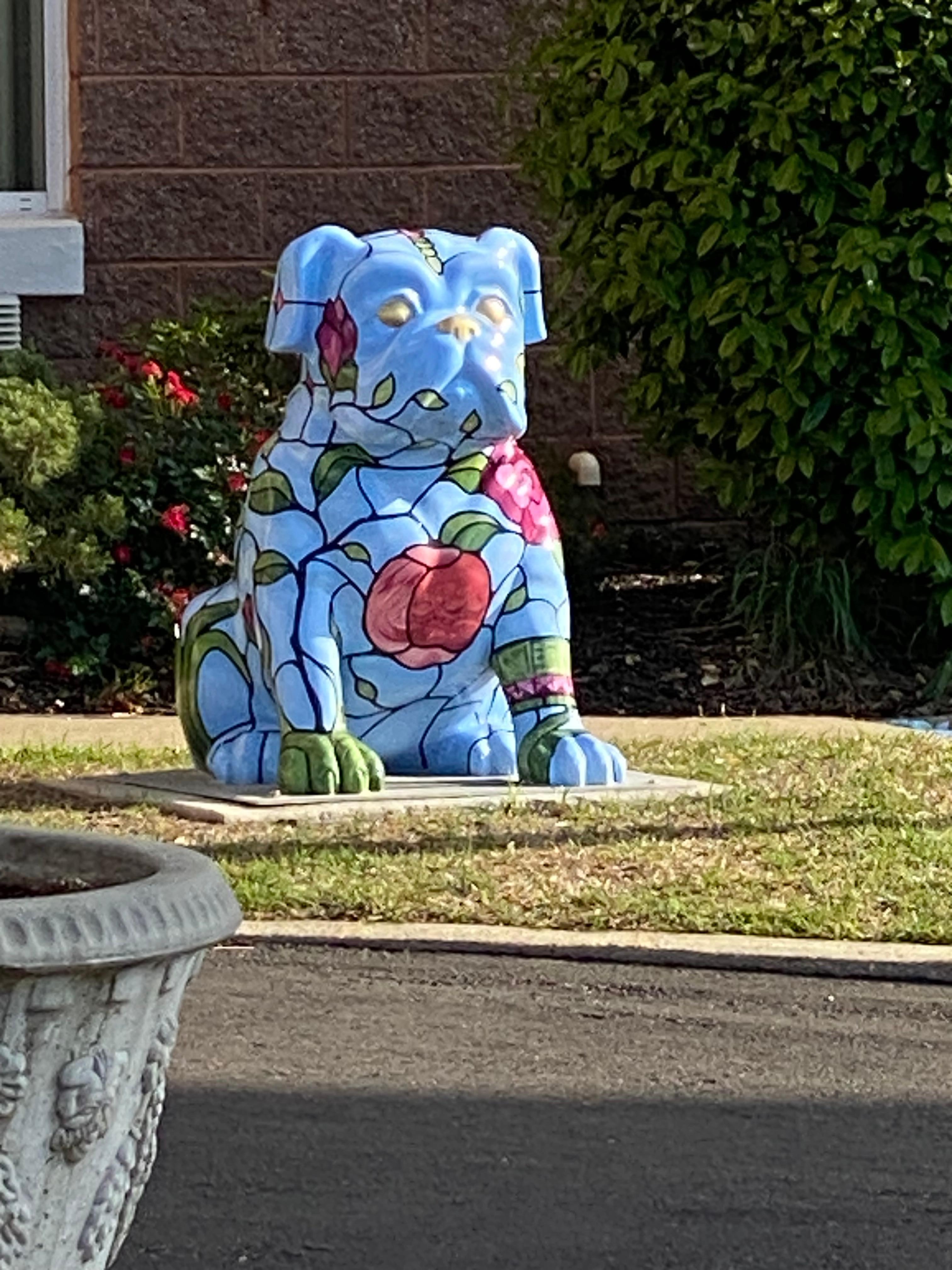 Cute bulldog art out front