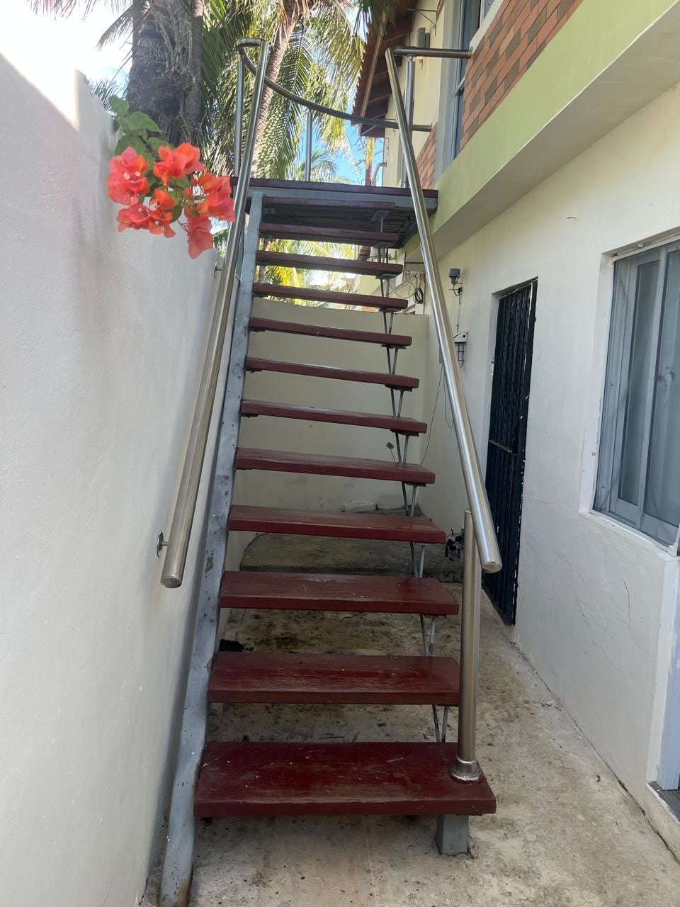 Wobbly dangerous stairway to the “premium” suite.