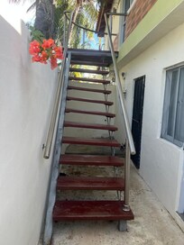 Wobbly dangerous stairway to the “premium” suite.