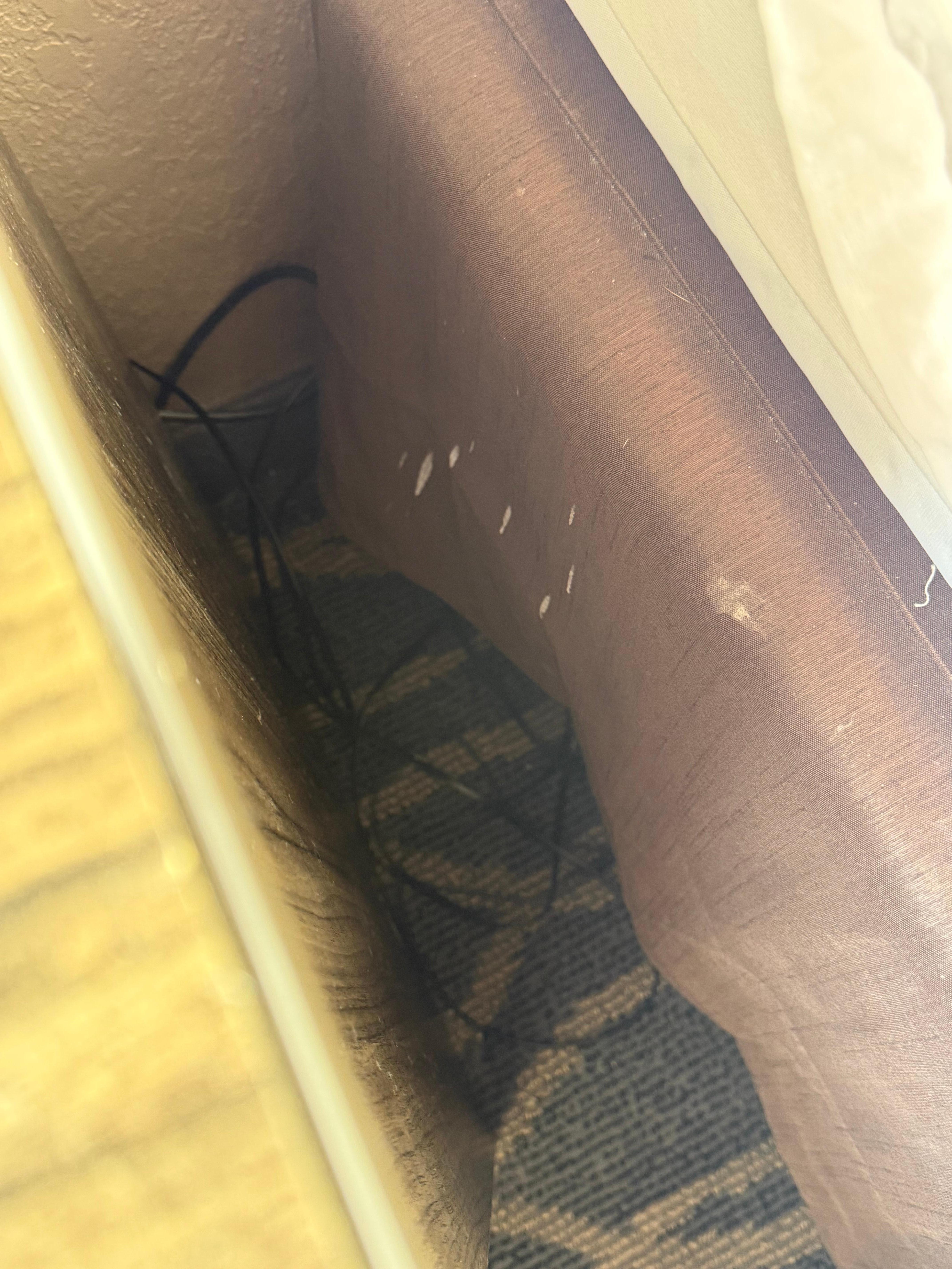 There was white stuff dripping down the nightstand and side of the bed