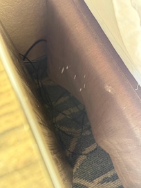 There was white stuff dripping down the nightstand and side of the bed