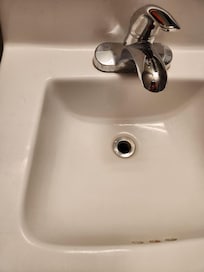 There are lots of cleaners out there that will get rid of the hard water stains.