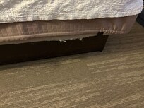 Close your view of the worn bed msterial.