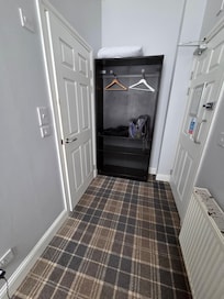 Wardrobe and entrance to the room