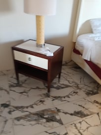 Disgusting dirty washcloth on end table