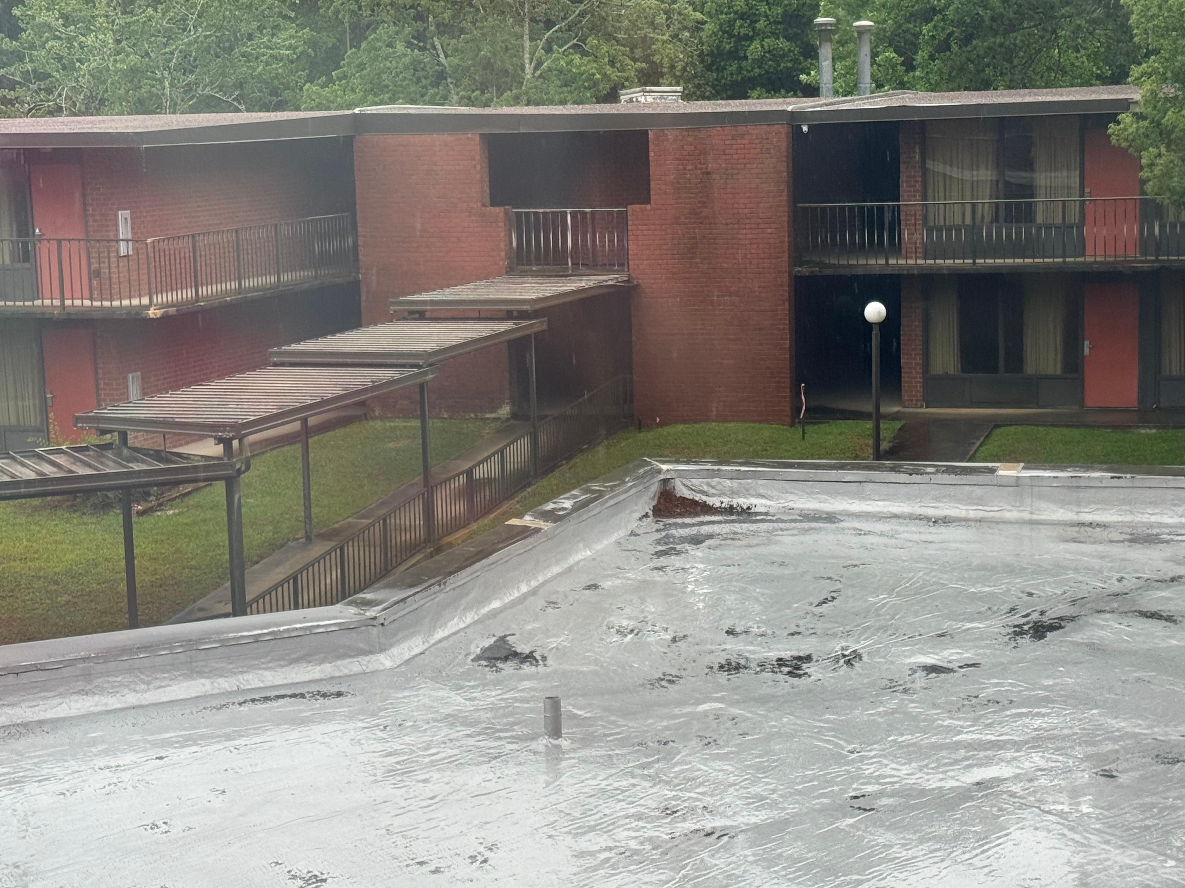 View from our hotel  window abandoned section of hotel and closed pool 