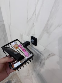Broken shower soap shelf kept falling off.