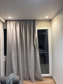 Curtain that didn’t cover the windows and provided zero privacy