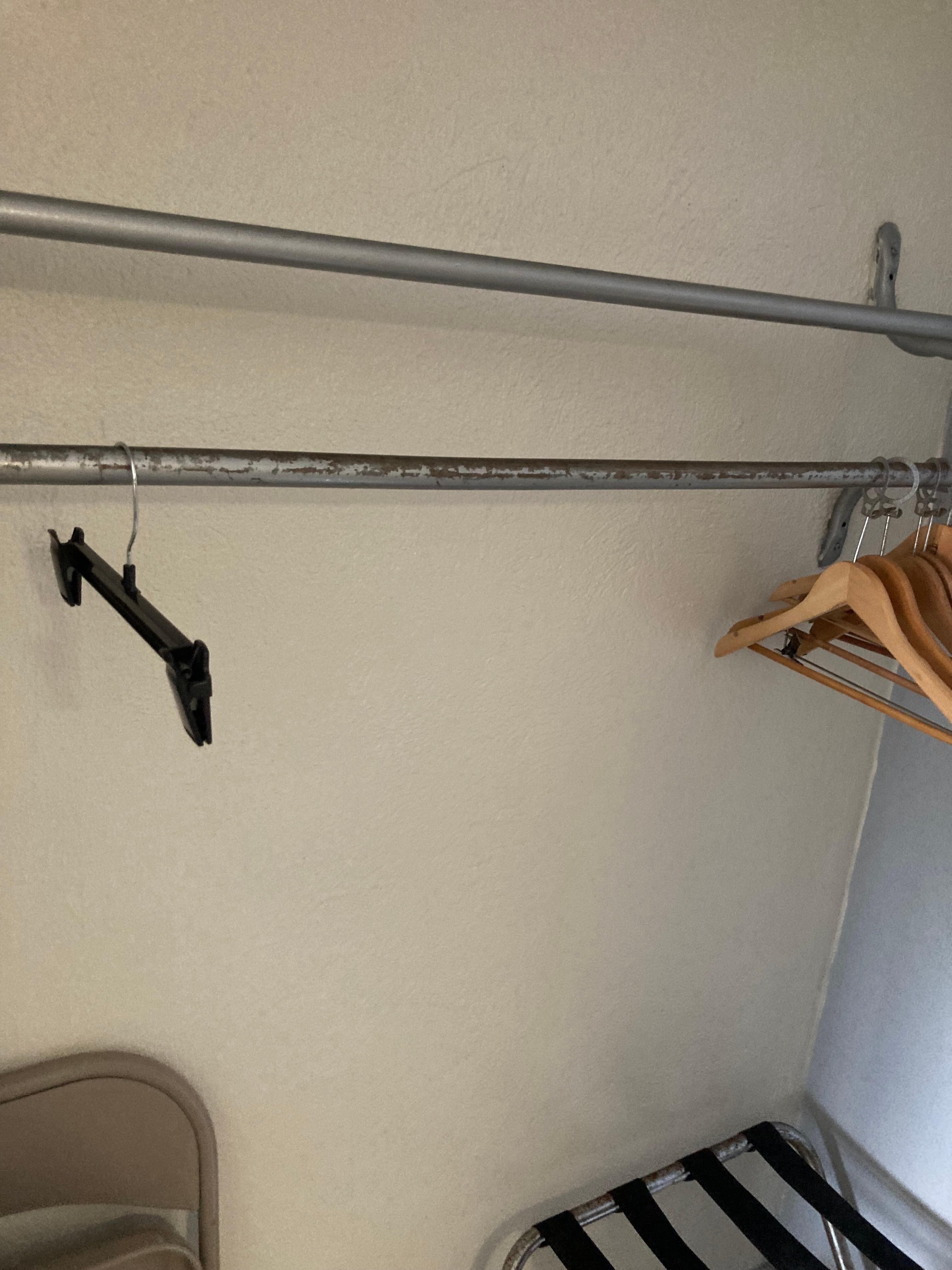 Rusty hanger rack and rusty suitcase holder
