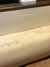 This odd the upholstery from the daybed