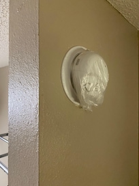 Smoke detector sealed off with a drink cup baggie