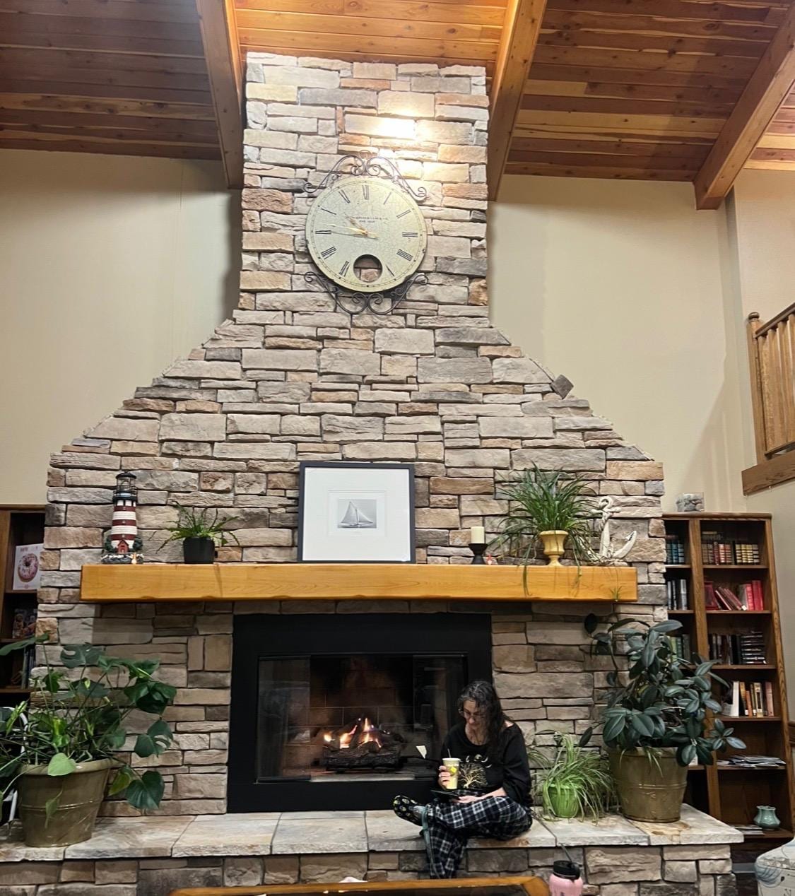 Reading at the fireplace