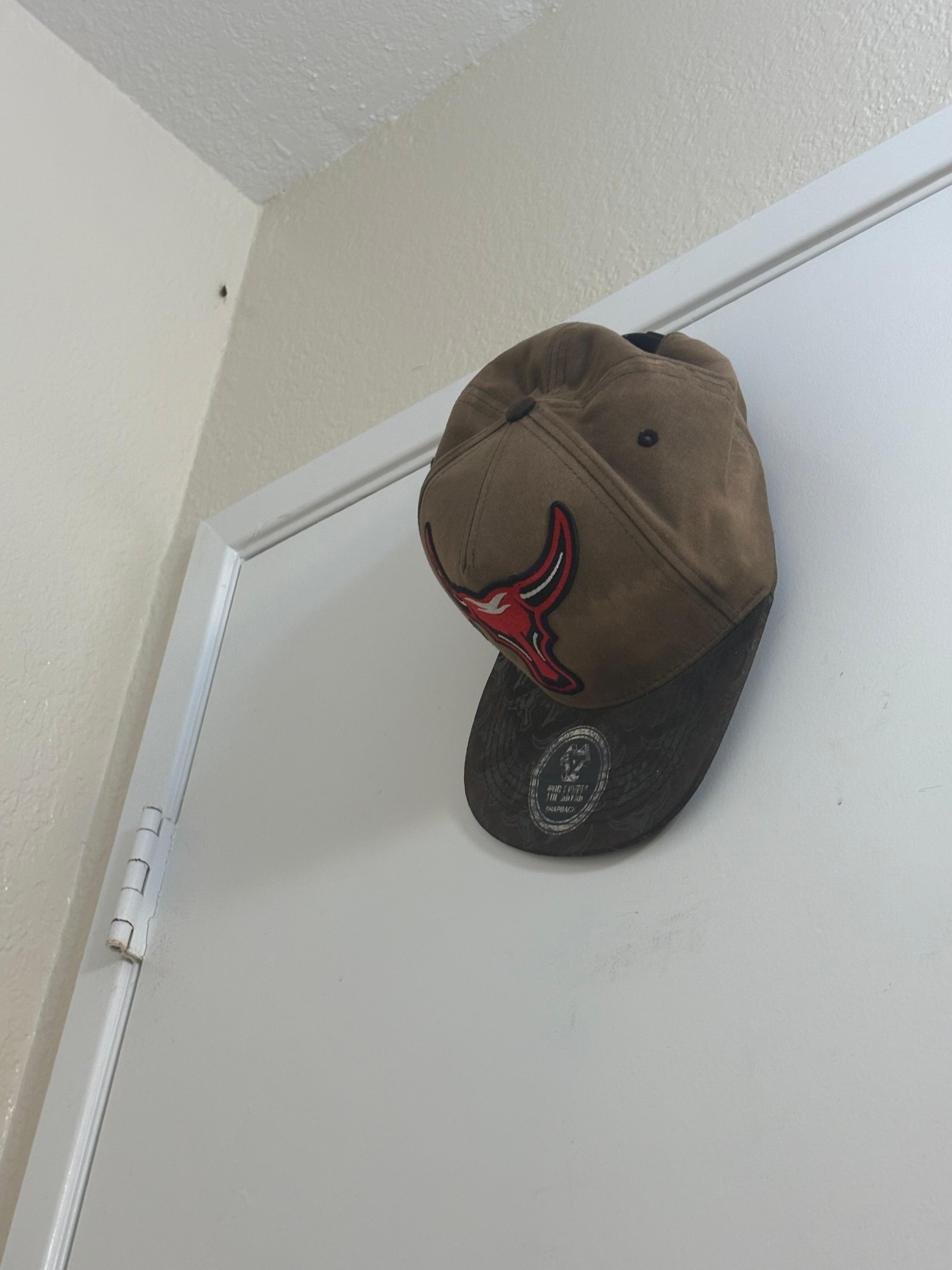 Room 213 somebody left his hat 