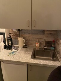 Counter top could just about fit the hot plate in the cupboard.