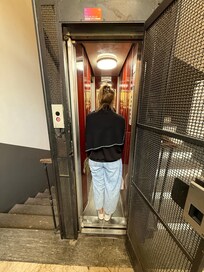 One person elevator to get to 3rd floor where there is a desk