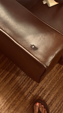 Chair burn holes on it and sticky