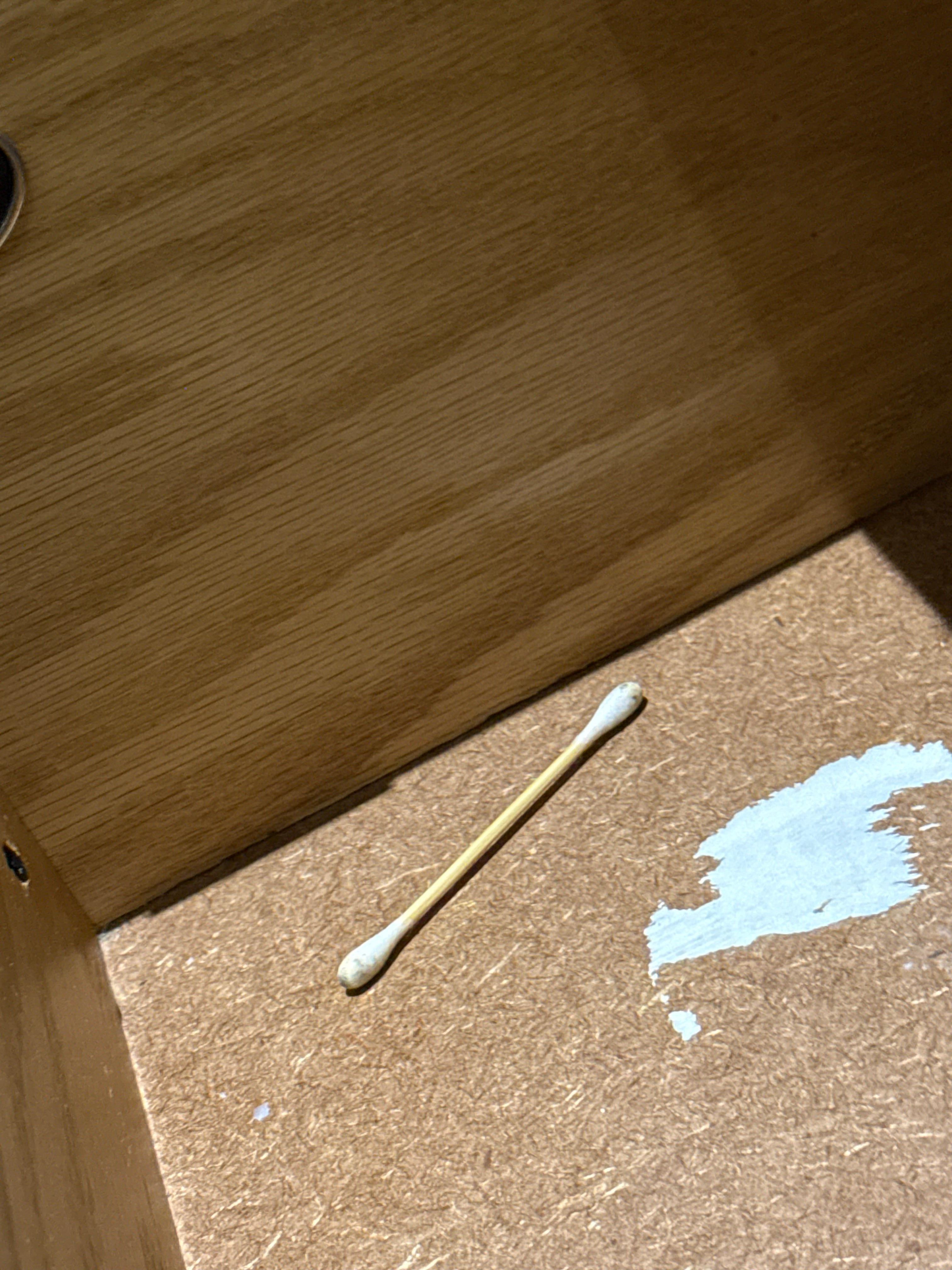 Used Q-Tips in drawer. 