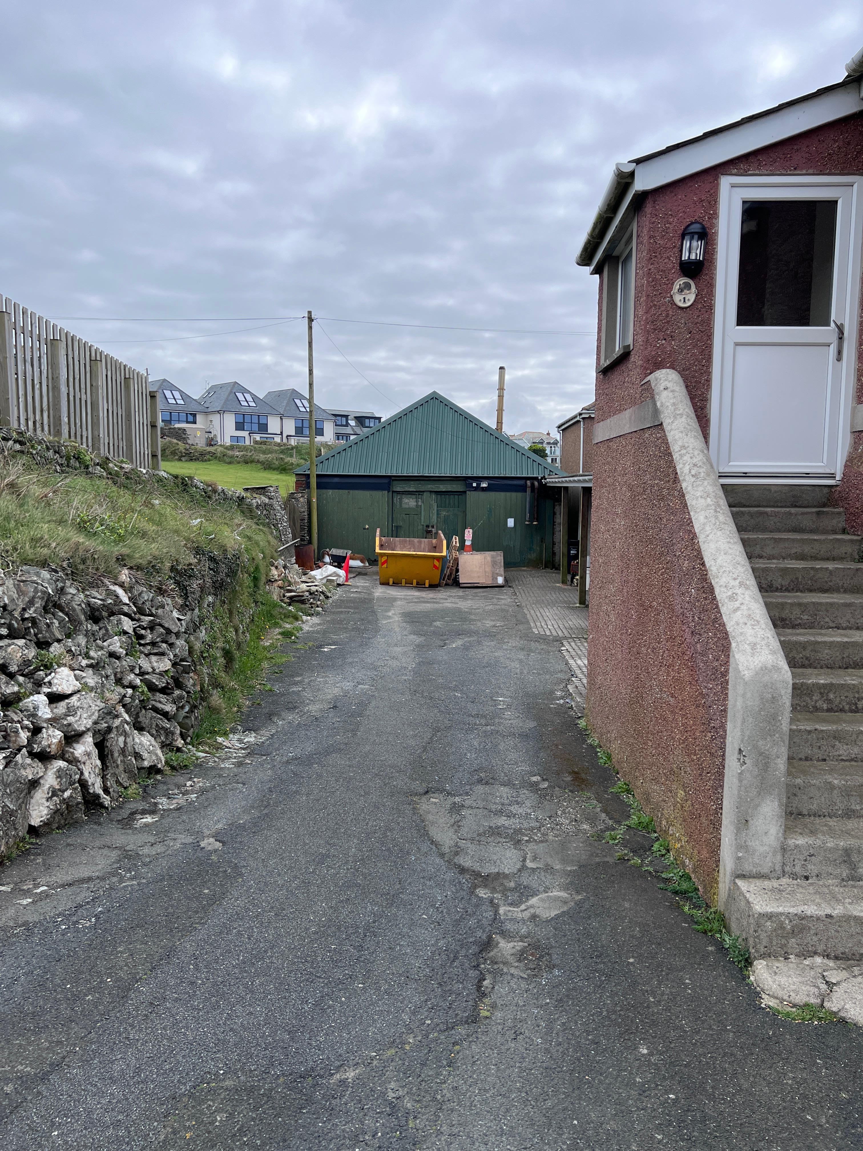 The side of the accommodation where you go if you book an apartment. Skip in view. 