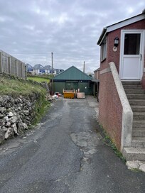 The side of the accommodation where you go if you book an apartment. Skip in view.