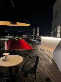 Beautiful lit up pool by night