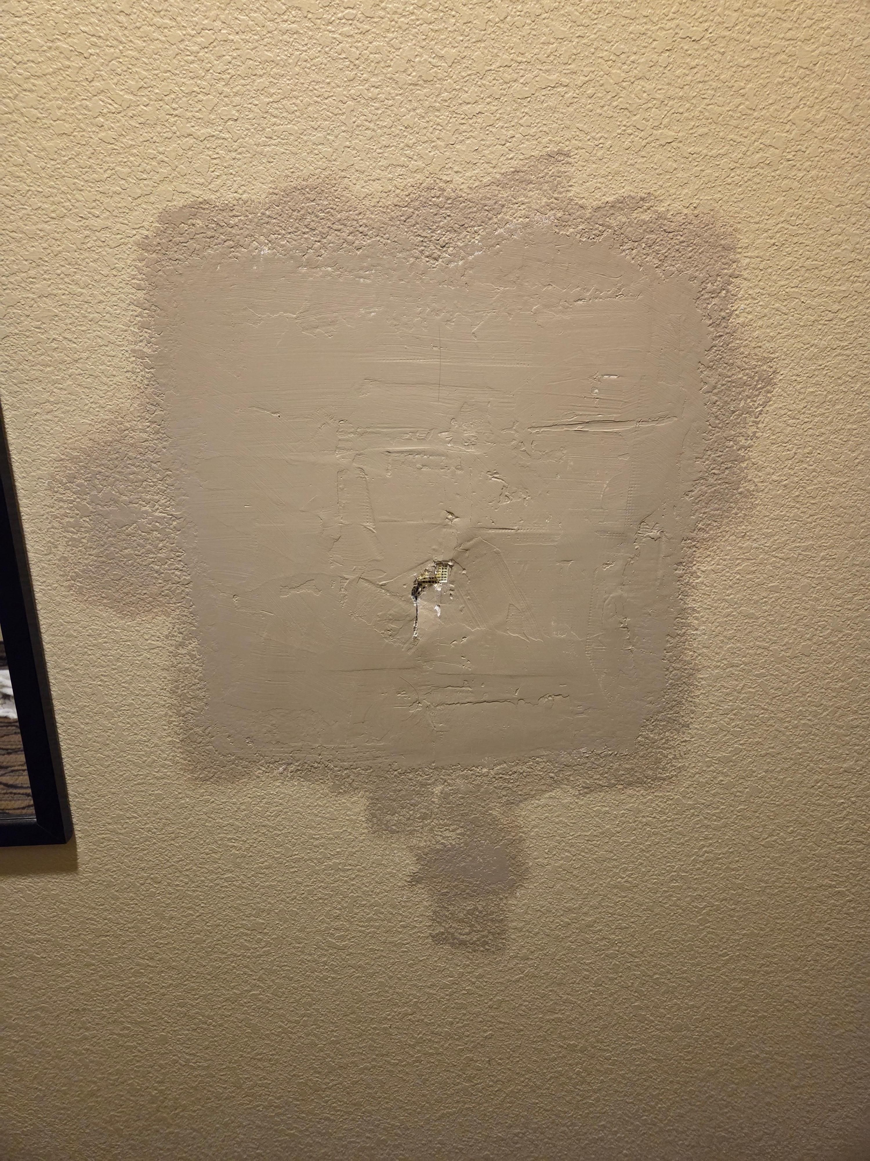 There was a hole behind the door. 