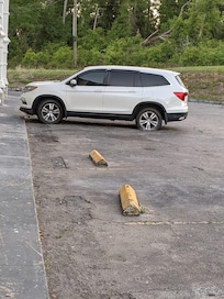 Vehicle in back parking area.