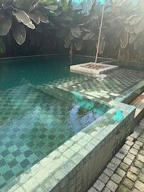 note the submerged stairs with nothing to hold.