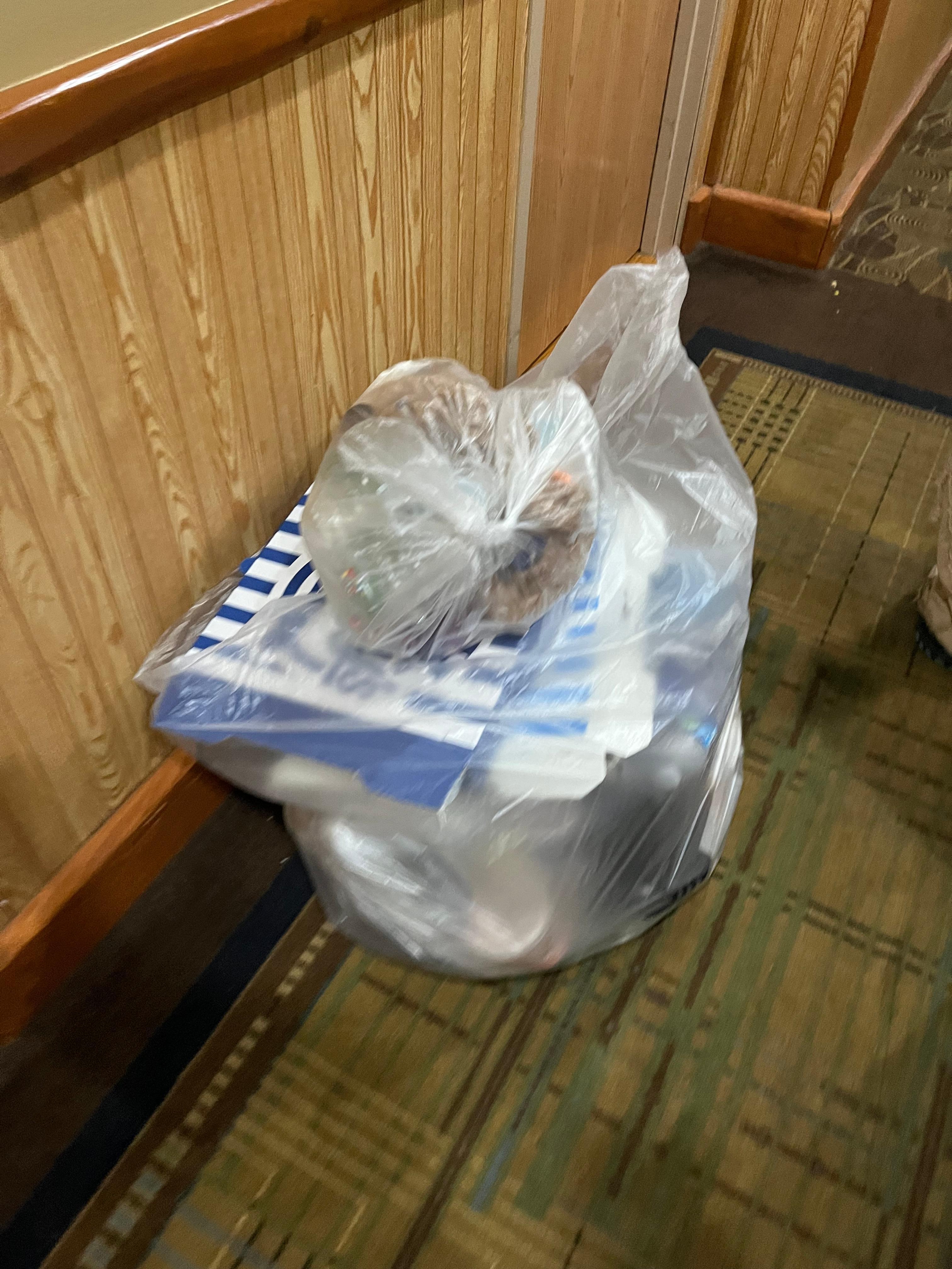 Hallways with garbage and linen stayed in the hallway overnight, still there the next morning.