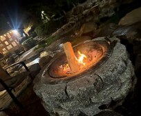 Sitting by the fire and listening to the waterfalls nearby - peaceful.