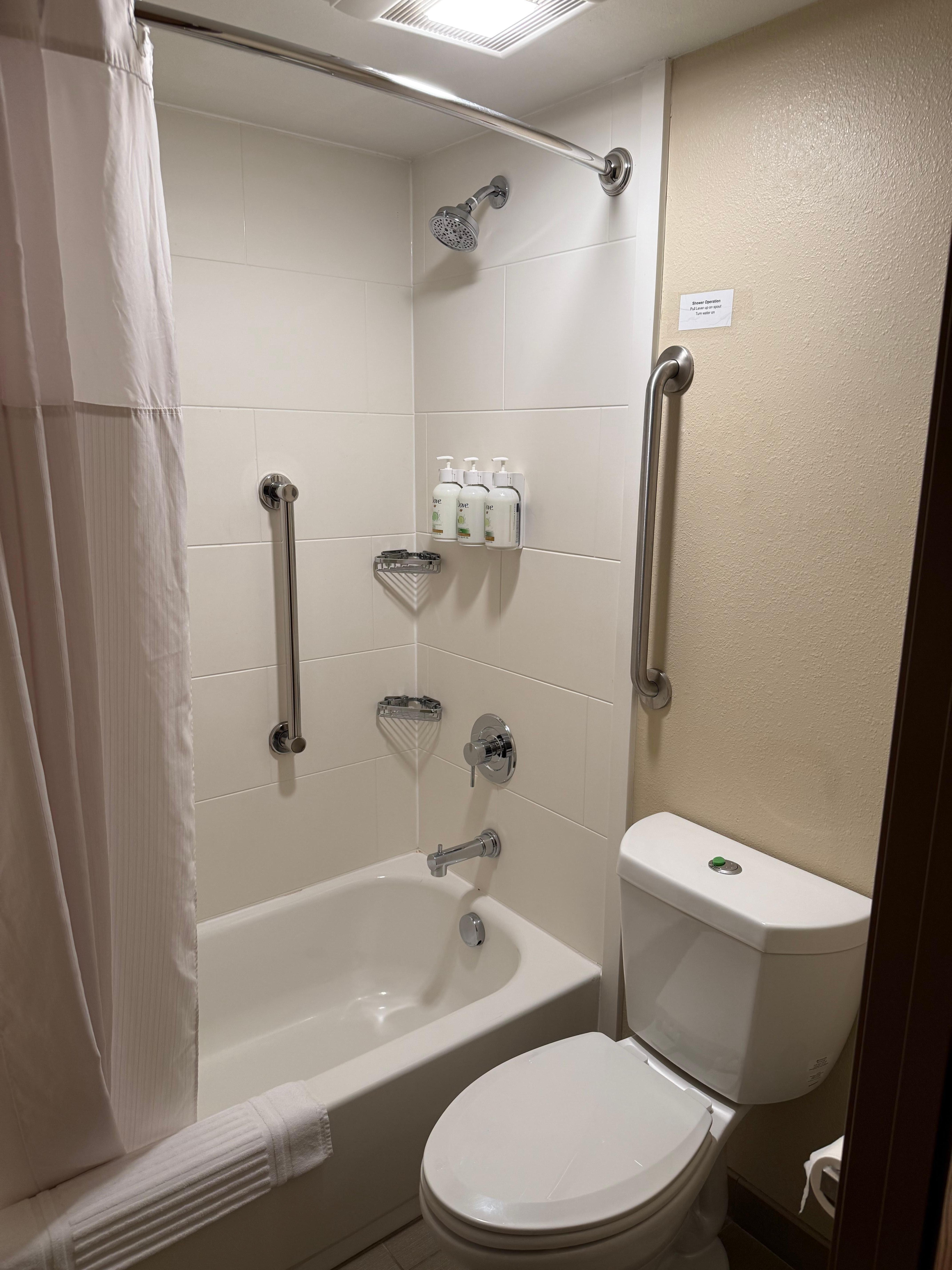 Bathroom had toilet and shower. Sink was outside the bathroom.